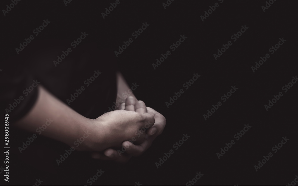 Praying hands concentrating attentively and meditation on beliefs or ...