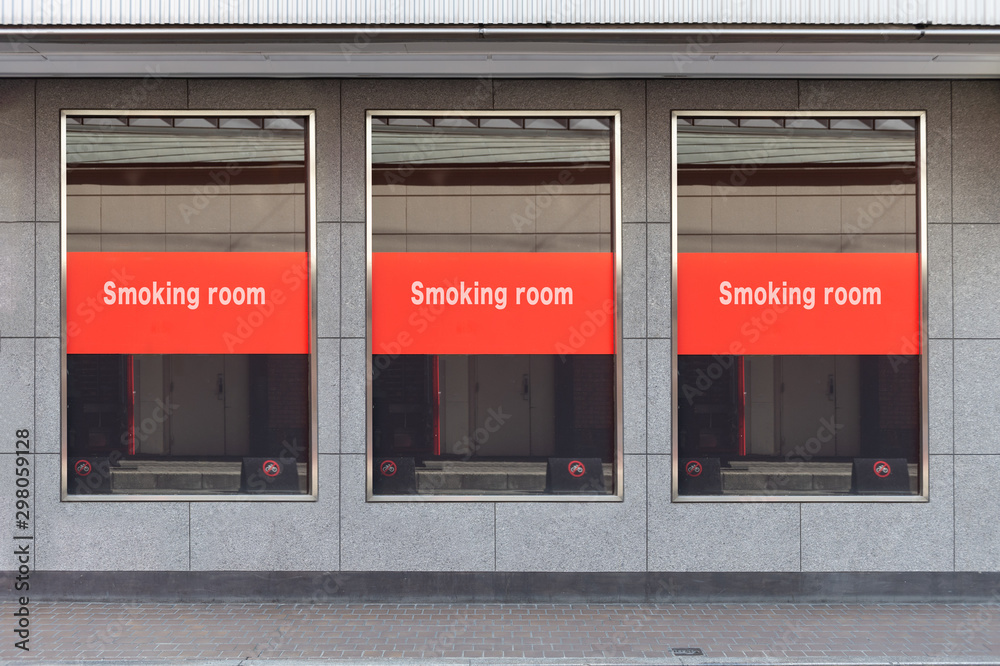 Smoking area zone:Unidentified poeple smoke in designated smoking area ...