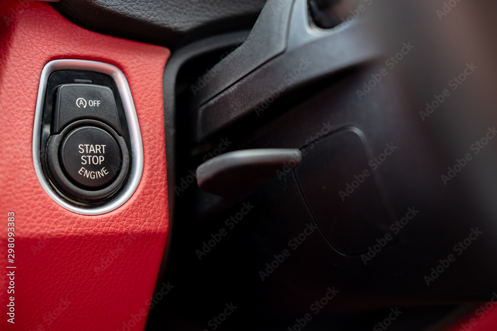 Close-up, isolated image of an engine Start Stop button seen on the ...