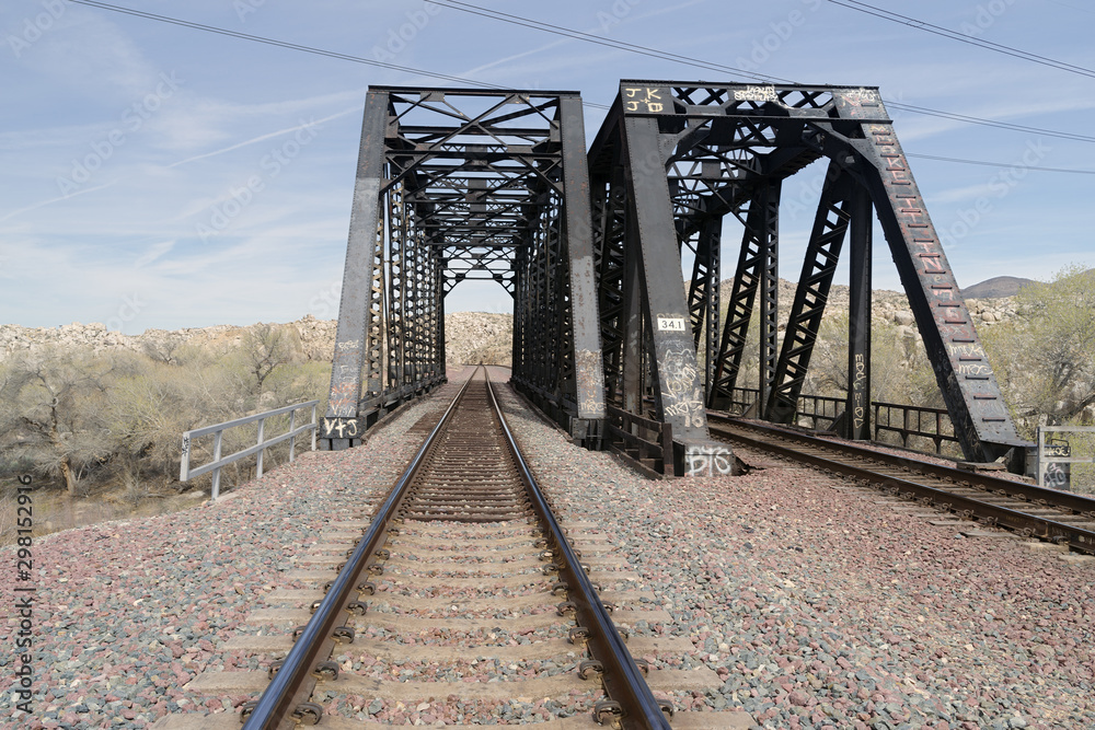 Image of showing a truss bridge and railroad tracks over the Mojave ...