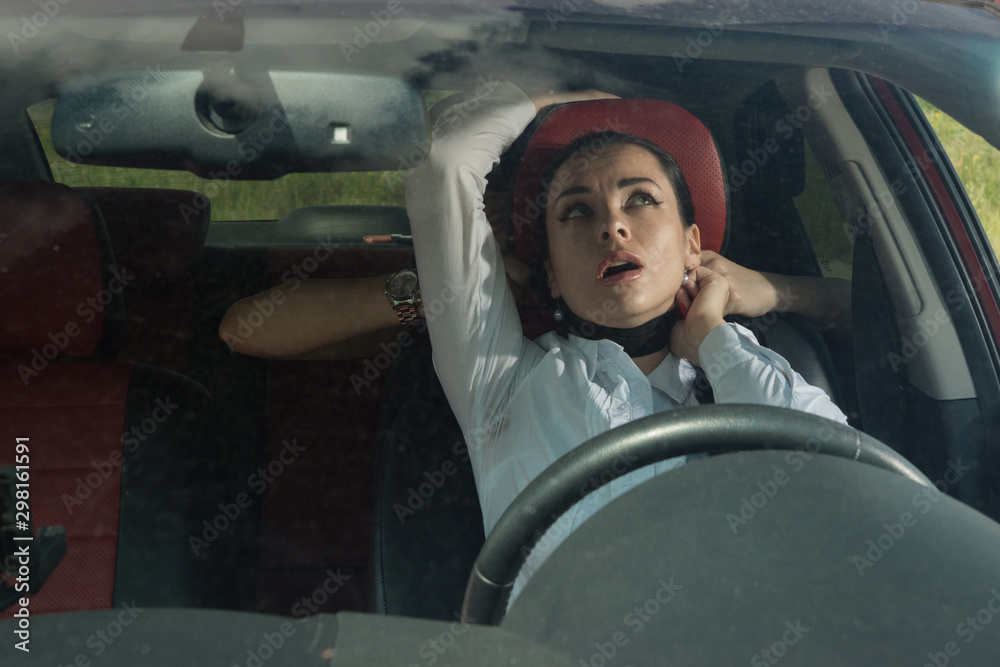 Scene from a detective series. Killer strangles business woman in her ...