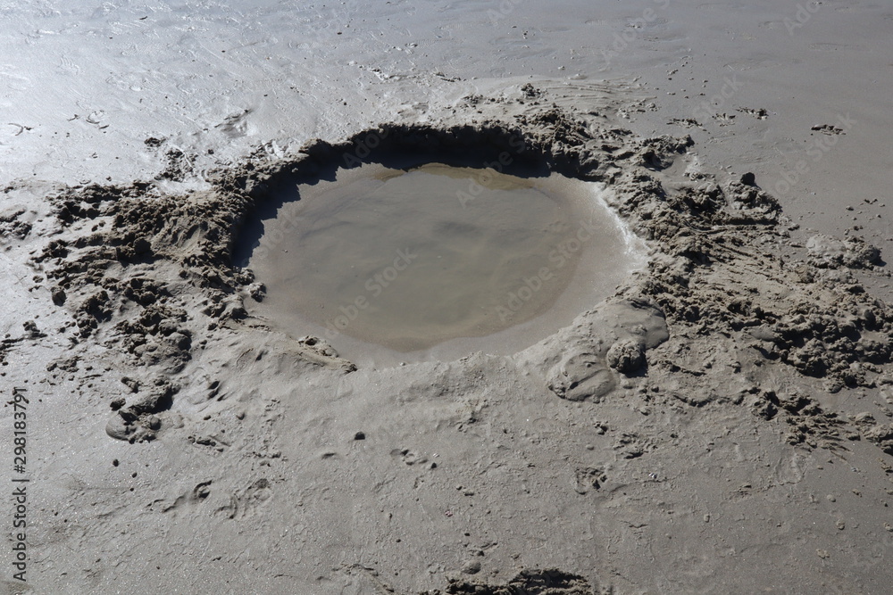 puddle on mud sand Stock Photo | Adobe Stock