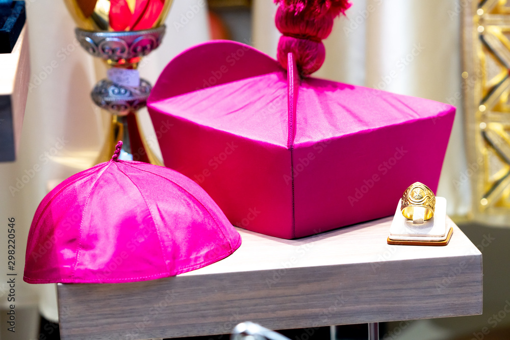 Purple biretta and galero, hats worn by Roman Catholic clergy Stock ...