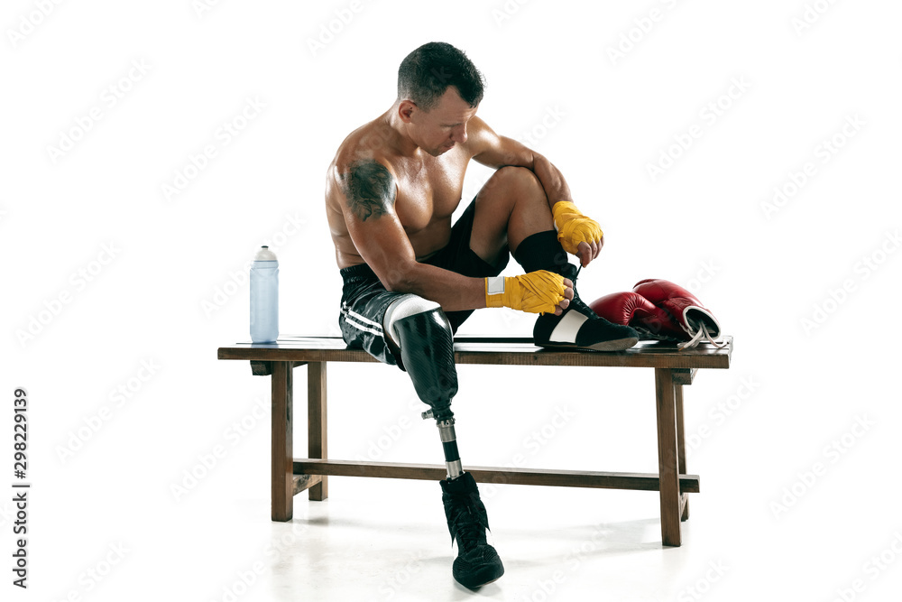 Full length portrait of muscular sportsman with prosthetic leg, copy ...