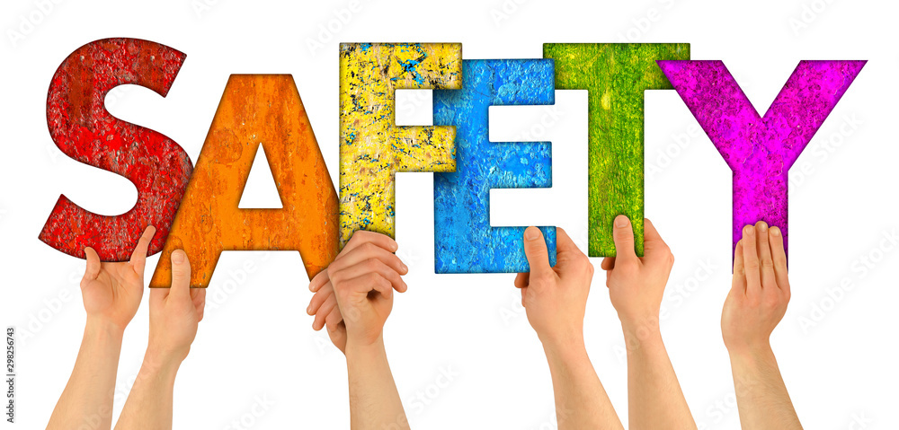 people holding up colorful rainbow wooden letter with words Safety ...