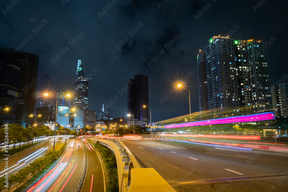 Saigon Cityscape Nighttime. Urban Metropolis with illuminated road and ...