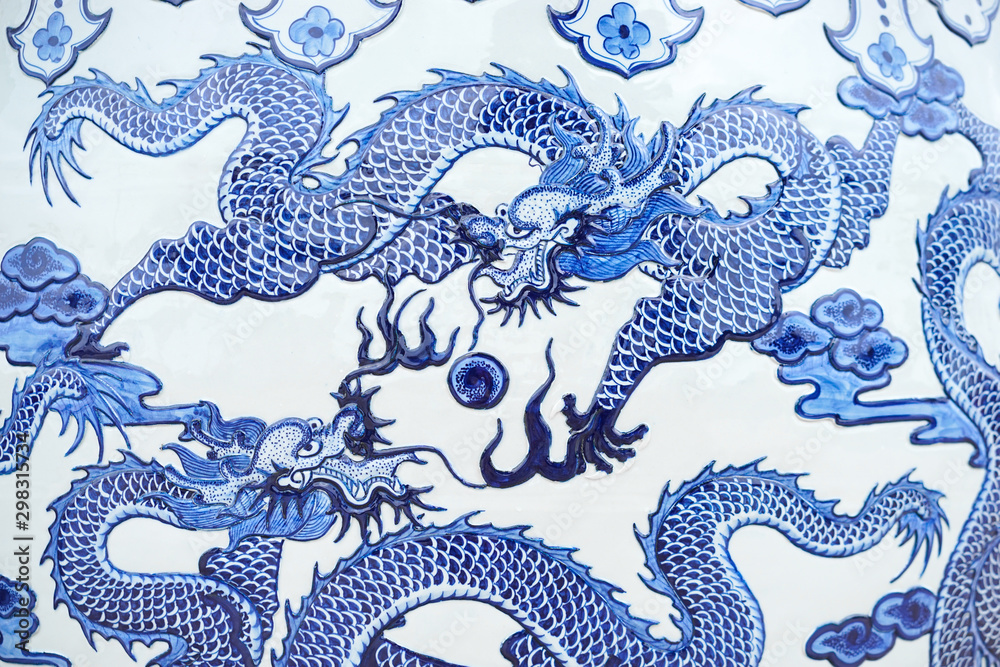 Dragon. A beautiful dragon pattern on a Chinese water jar. This is a ...