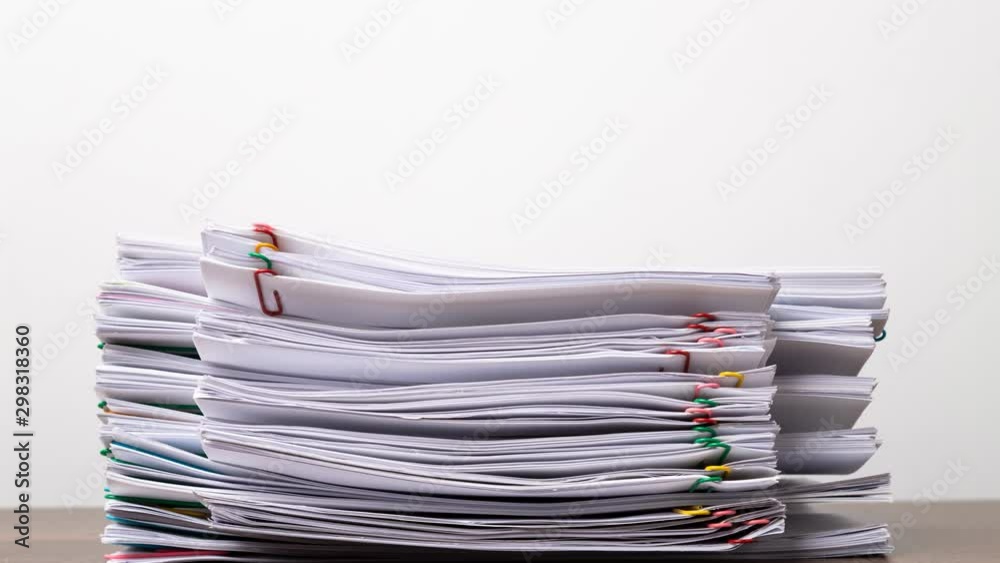 Stack overload document report paper with colorful paperclip place and ...