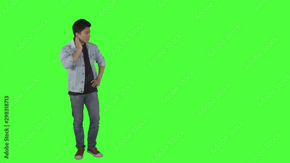 Full length of confused handsome man thinking something while walking ...