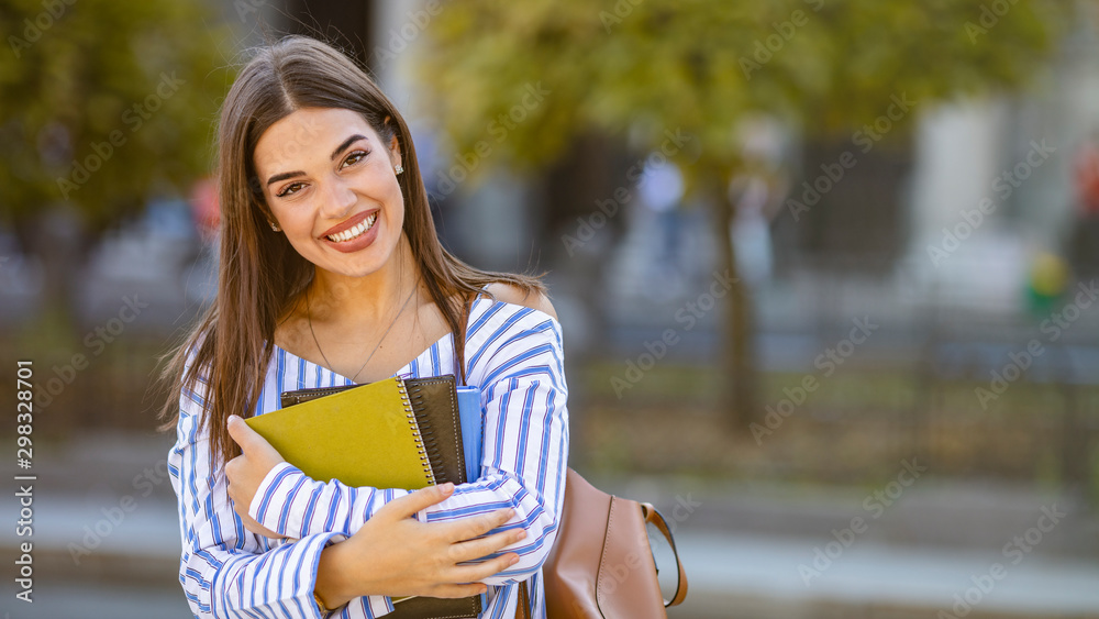 Students life on the campus. Portrait of perfect student at the ...