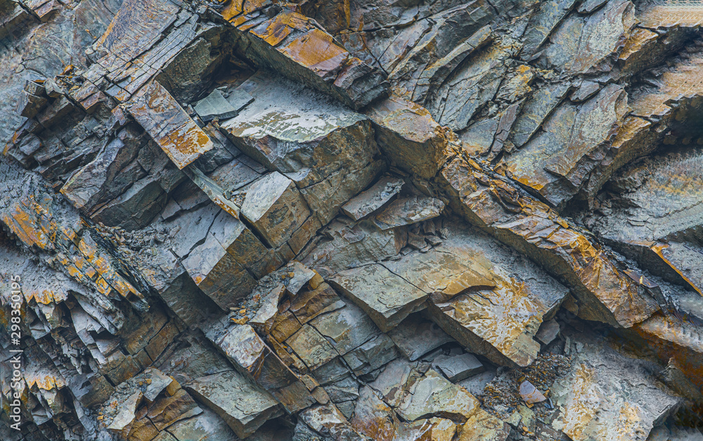 Texture, background layers and cracks in sedimentary rock on cliff face ...