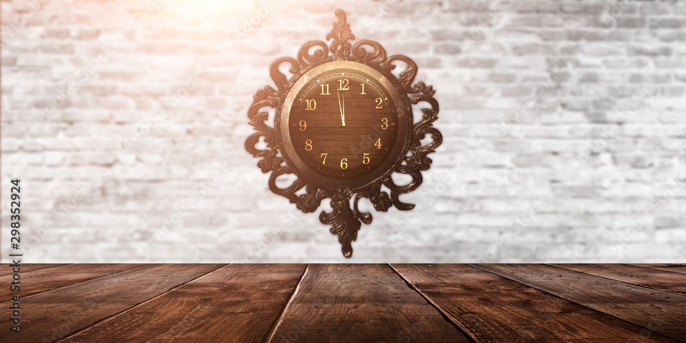 Dark room, spotlight, rays. Old clock in a metal frame. Old brick wall ...