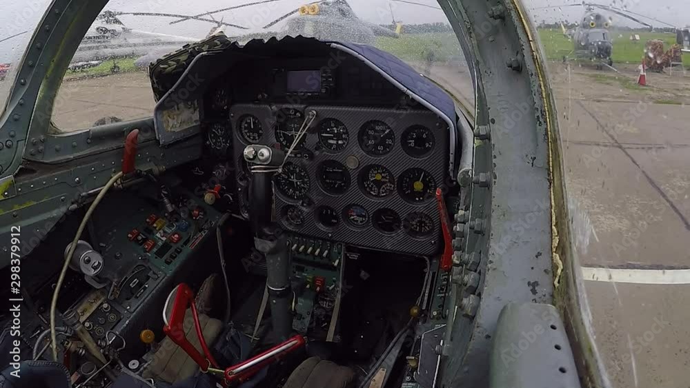 Video Stock People move a combat fighter plane to a parking spot at the ...