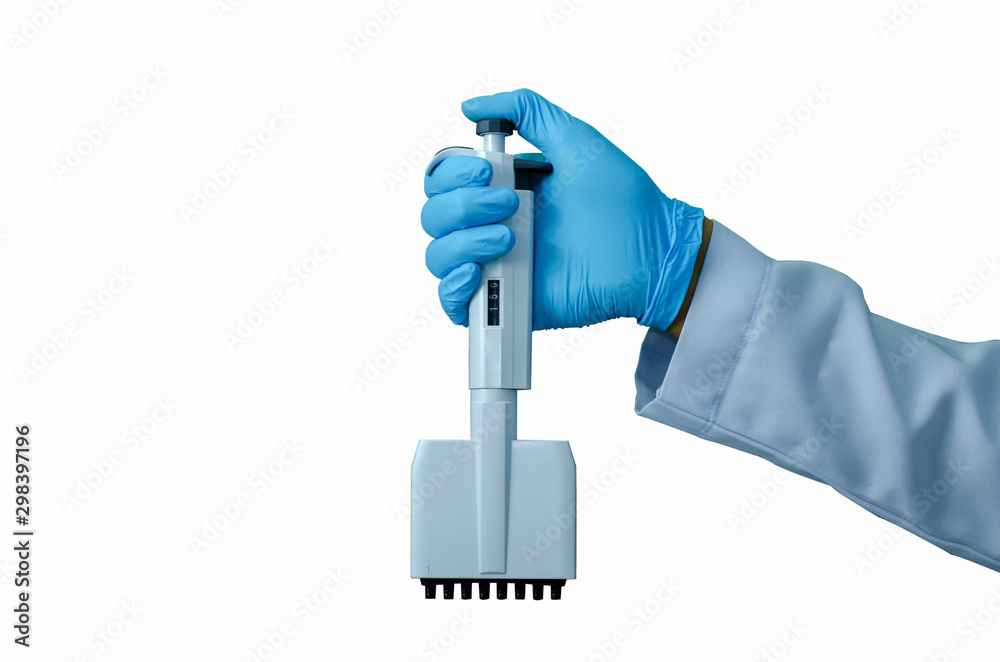 scientist hand holding Pipette laboratory equipment with blue latex ...