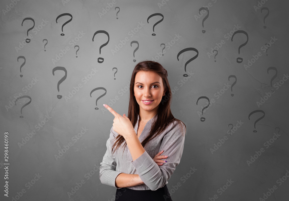 Person with question marks around face Stock Photo | Adobe Stock