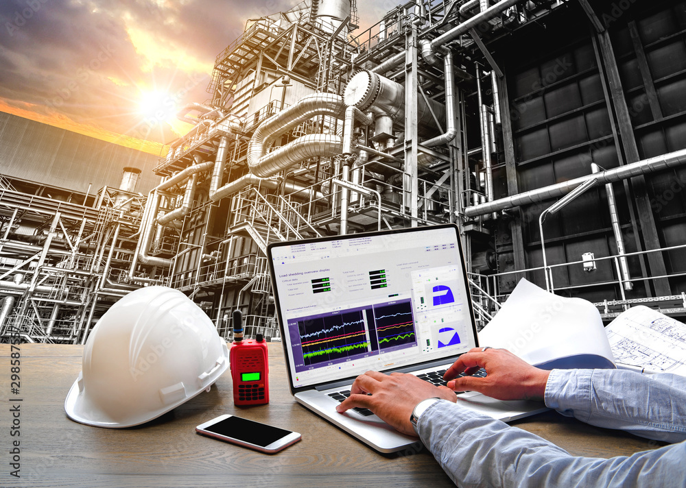 Double exposure Engineering Industrial concept in office with Oil and ...