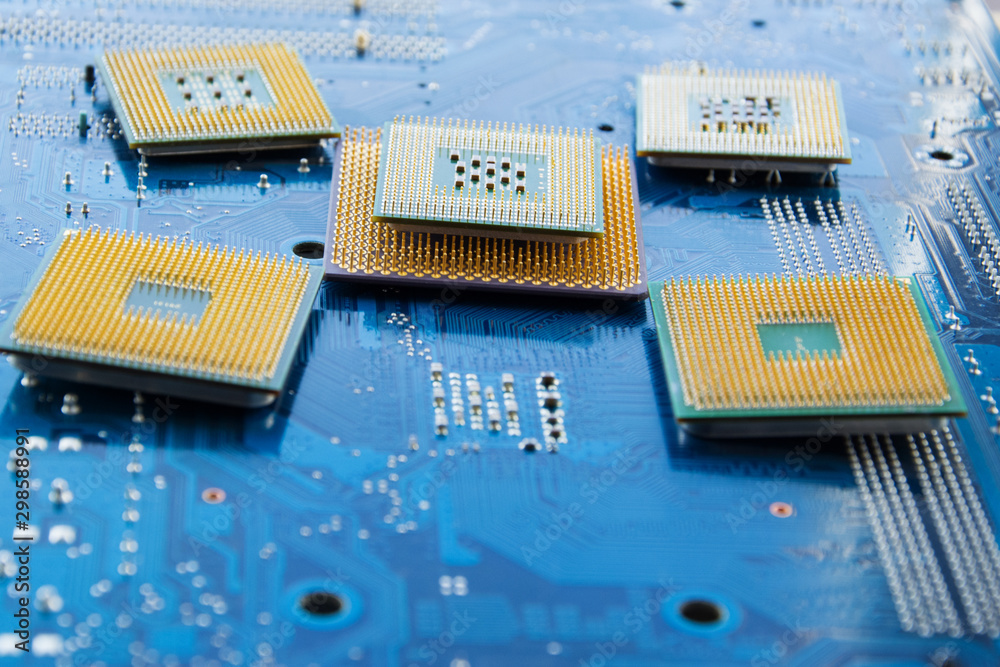 Many computer CPU close-up on the motherboard background, socket of ...