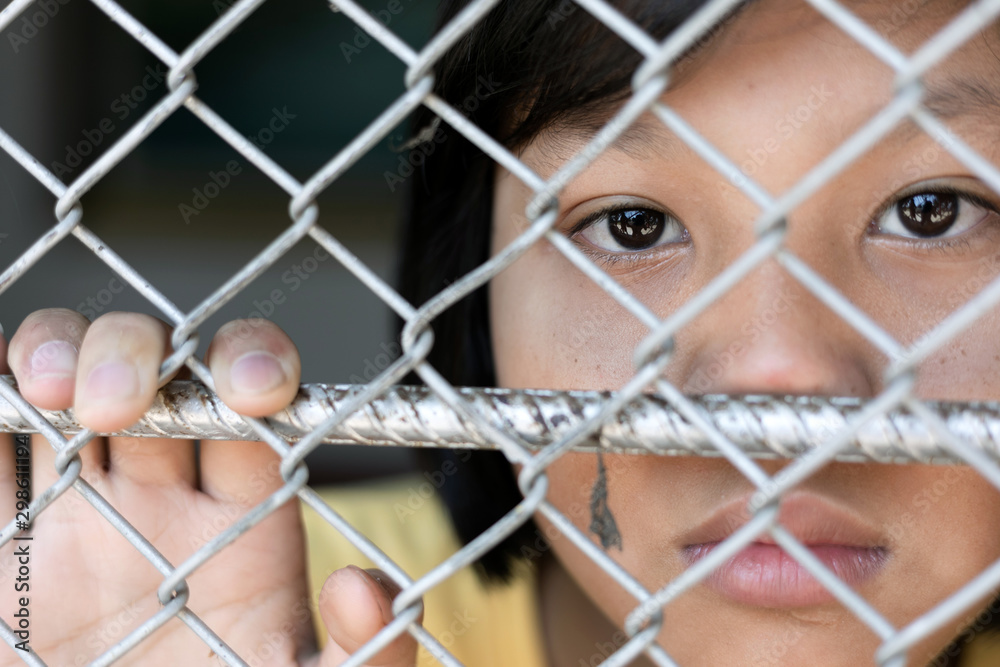 Fotografia do Stock: teen girl hold cage with eye sad and hopeless ...