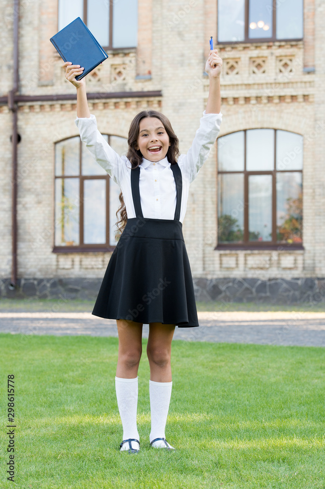 Hurray for school holidays. Happy child finish primary school. Cute ...