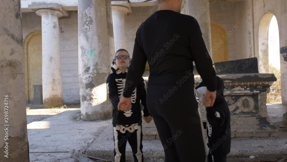 Video Stock Children and their mother in carnival costumes celebrate ...