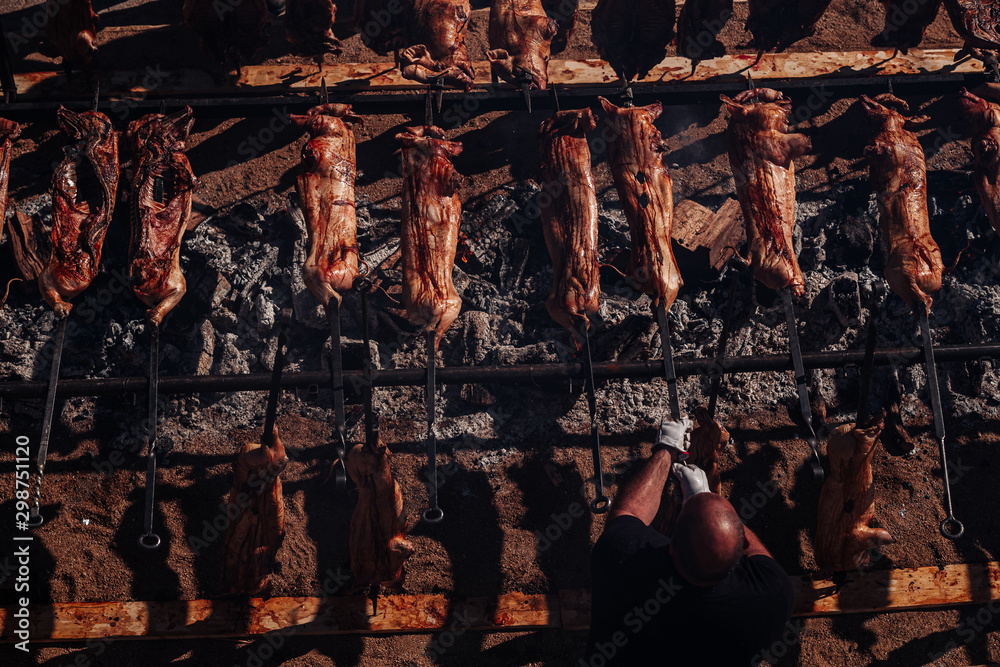 ORGOSOLO, SARDINIA /OCTOBER 2019: The old tradition of cooking the ...