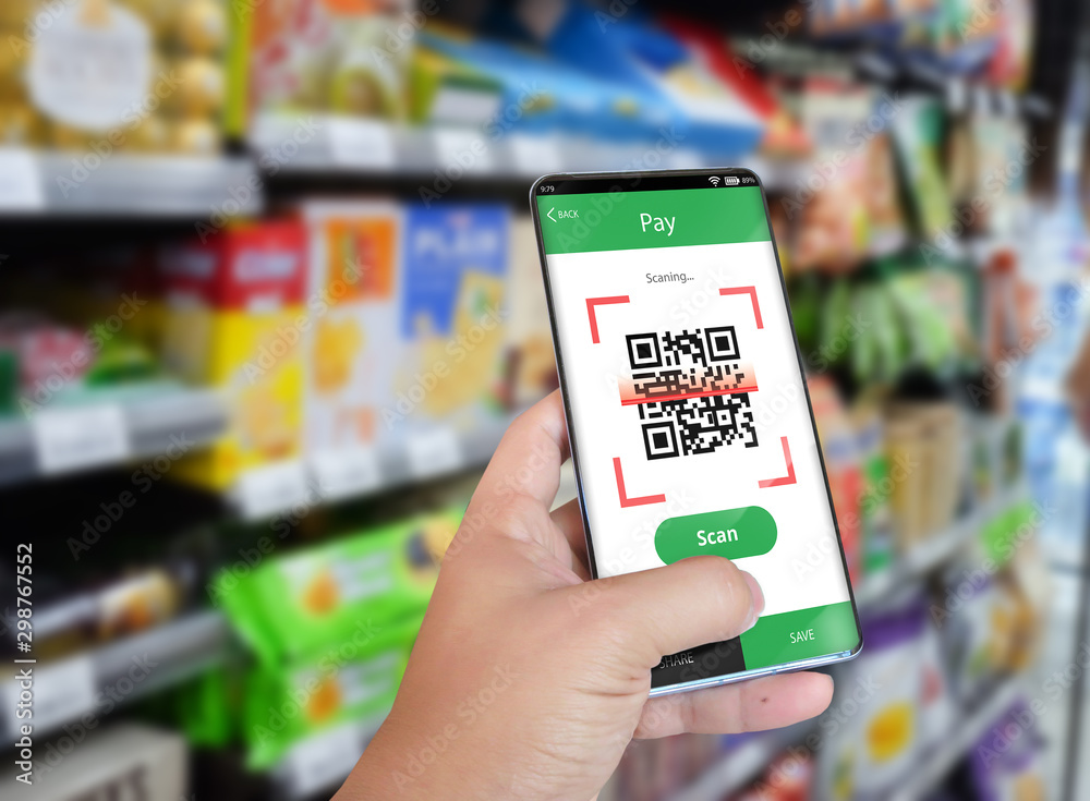 Hand holding smartphone to scan QR code payment , online shopping ...