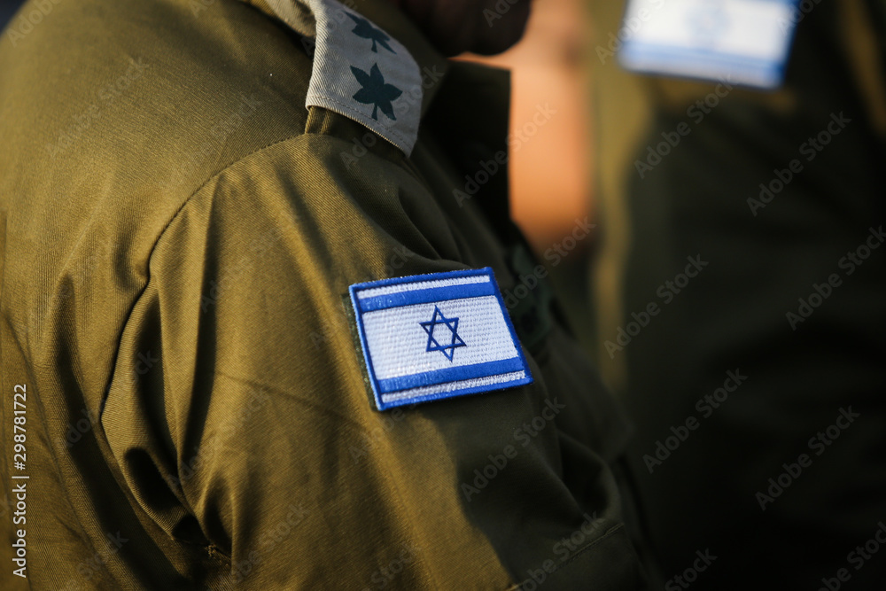 Israeli flag on a military medic uniform Stock Photo | Adobe Stock
