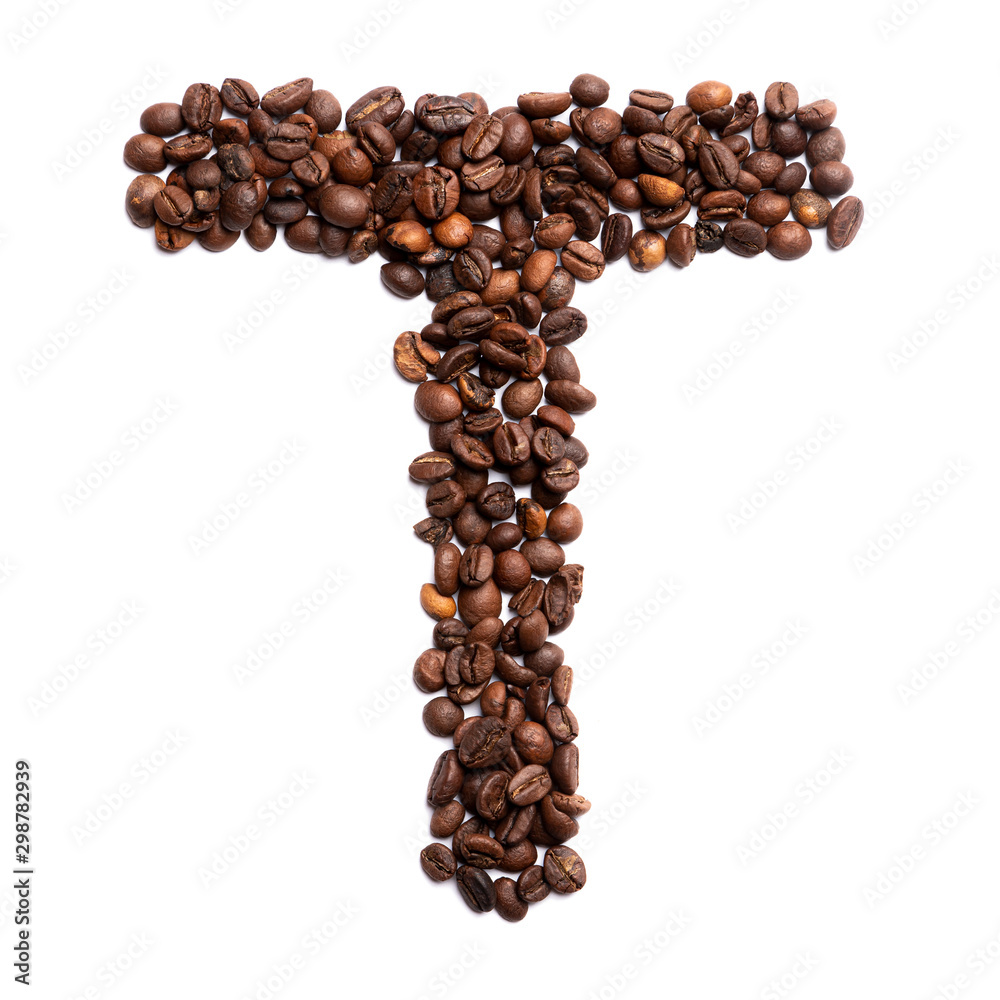Letter T of the English alphabet of freshly roasted cocoa beans on a ...