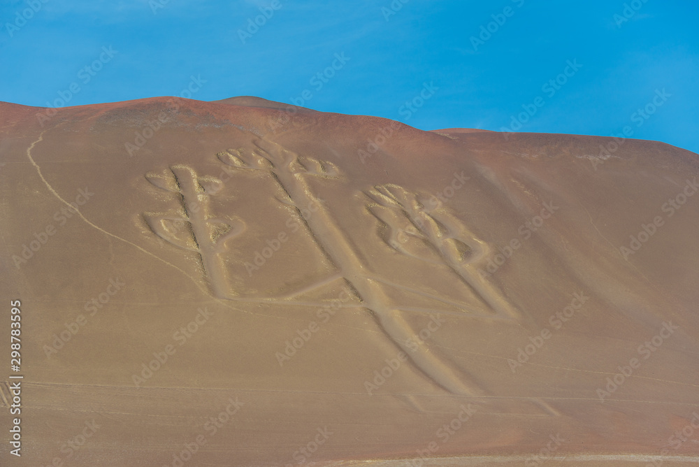 The Paracas Candelabra, also called the Candelabra of the Andes, on the ...
