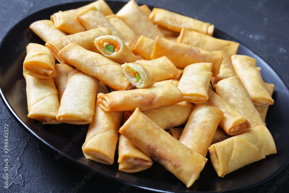 deep fried crispy chinese spring rolls, closeup Stock Photo | Adobe Stock