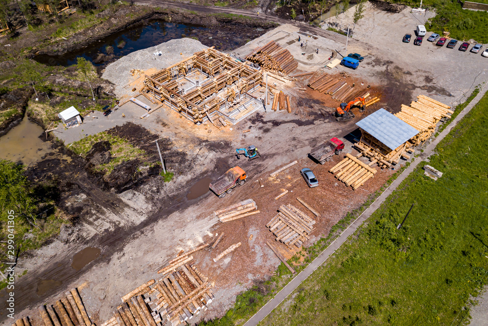 Aerial view of the construction site during the building of a wooden ...