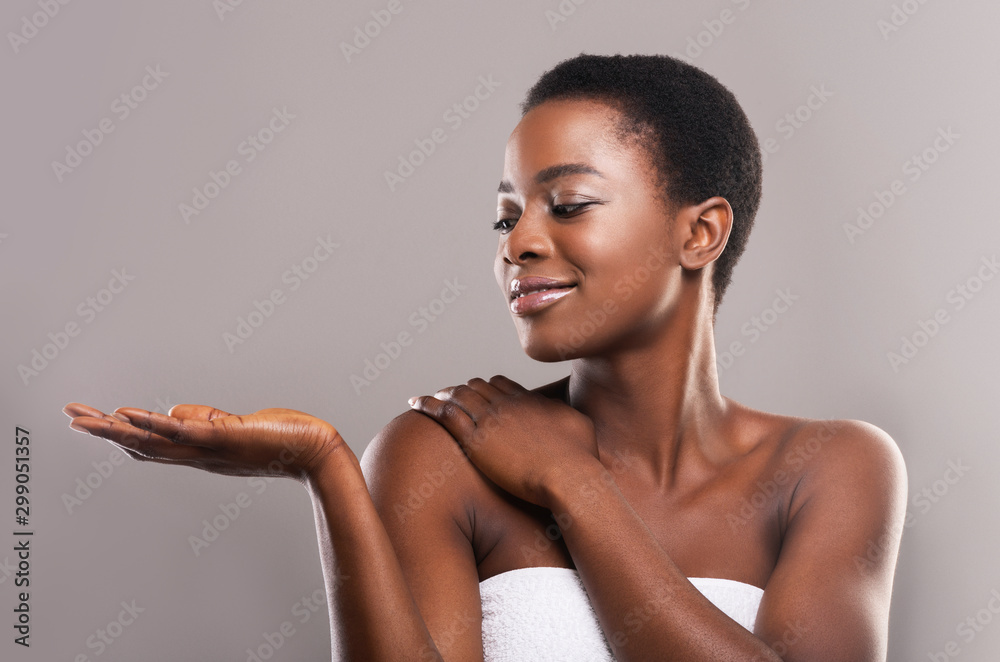 Beautiful black woman demonstrating something on her open palm Stock ...