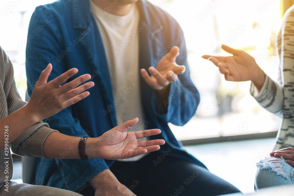 People sitting and talking together Stock Photo | Adobe Stock