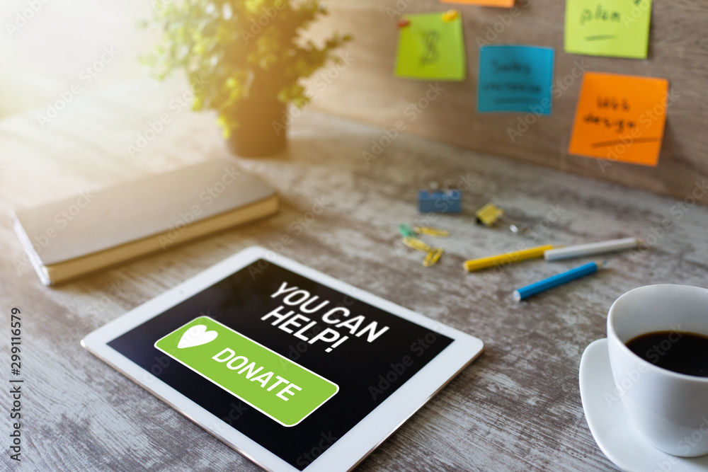 Help and donation button on device screen. Stock Photo | Adobe Stock