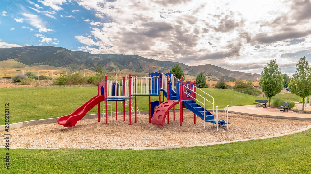 Panorama frame Fun childrens playground with amazing view of cloudy ...