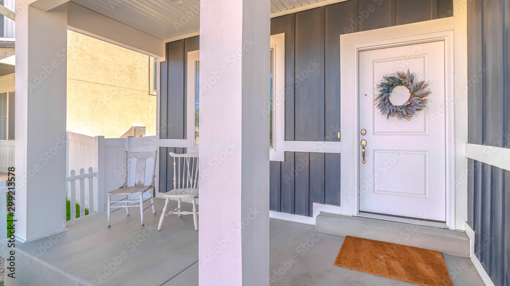 Panorama frame Front door and porch area of modern suburban home Stock ...