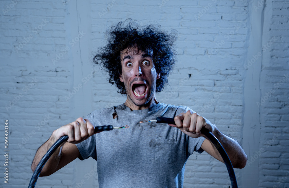 Funny image of man getting electric shock with funny face and smoke all ...