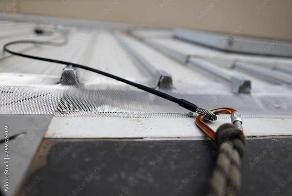 Picture of locking Karabiner connecting into first man up line ...