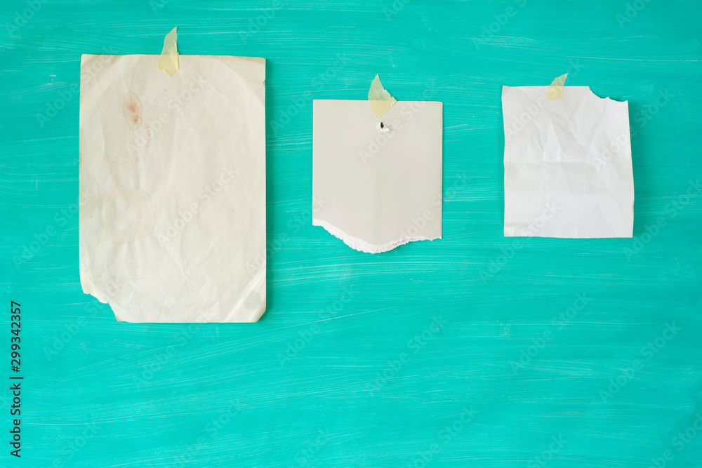 Blank leaflets, torn paper notes on message board, free copy space ...
