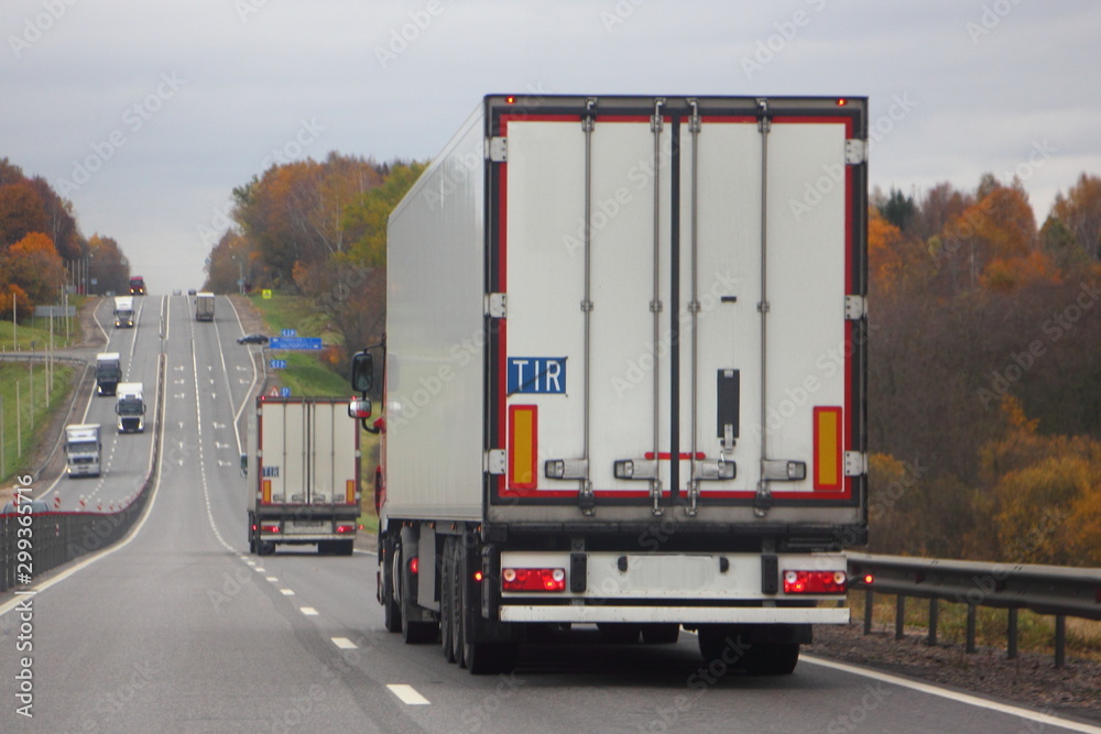 Logistics, shipping goods, road transportation - semi truck moving on a ...