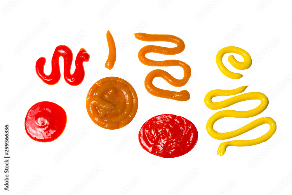 Ketchup and yellow sauce splashes isolated on white background. Stock ...