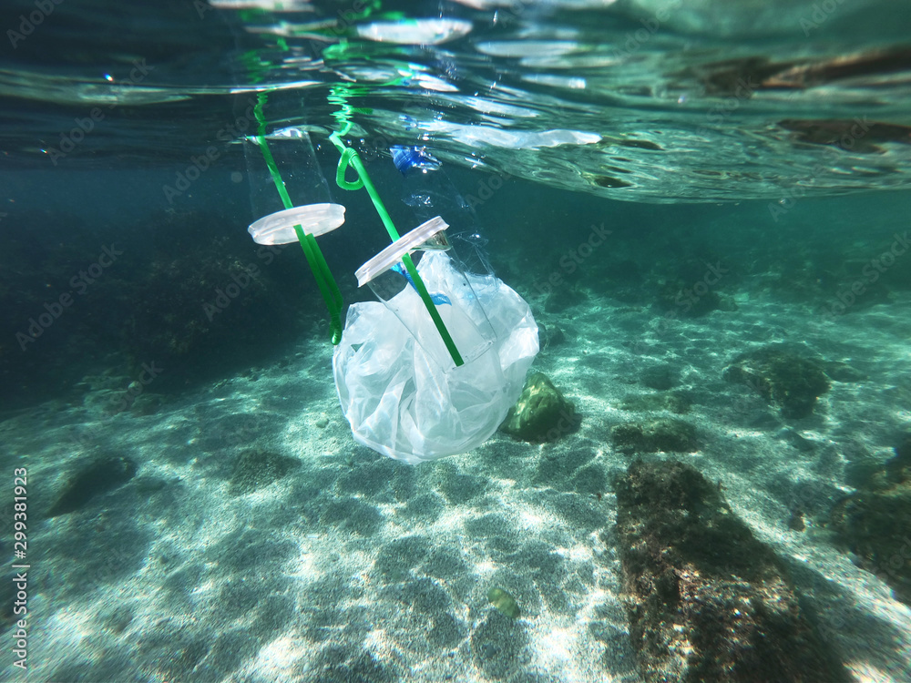 Plastic bags and bottles pollution in ocean Stock Photo | Adobe Stock