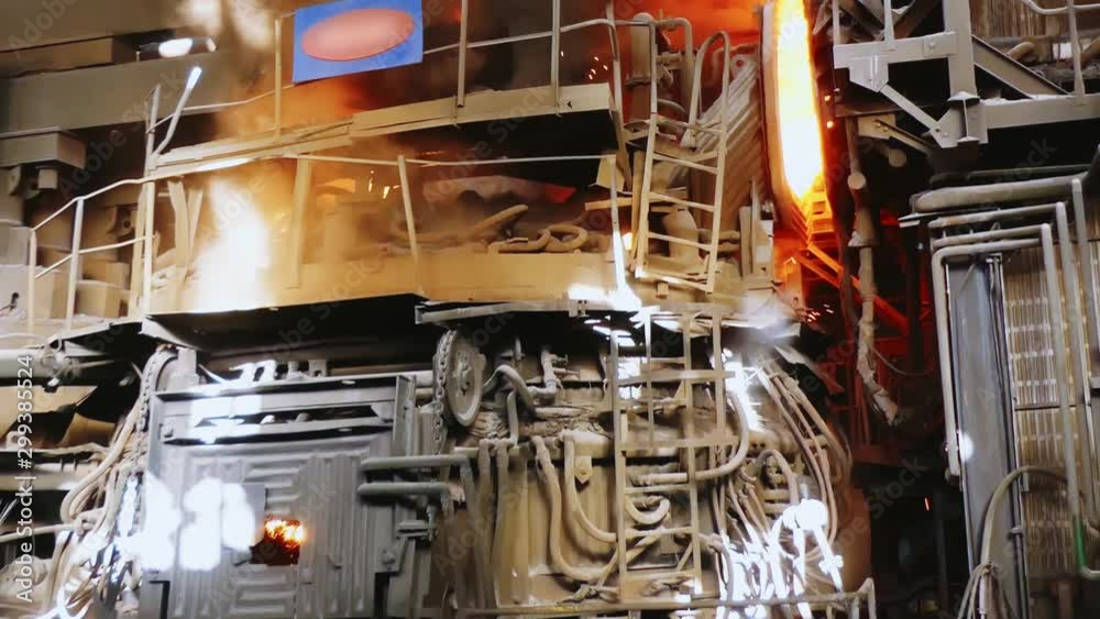 Steel production in a steelmaking furnace. Metallurgy. Casting ingot ...