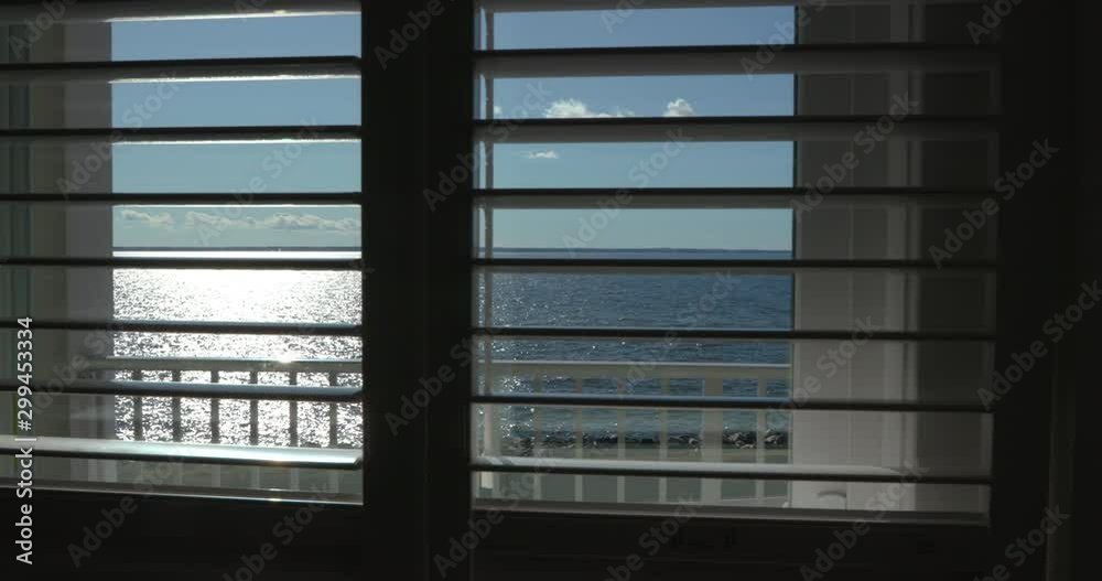 Ocean View through Window Slats During Evening Stock Video | Adobe Stock