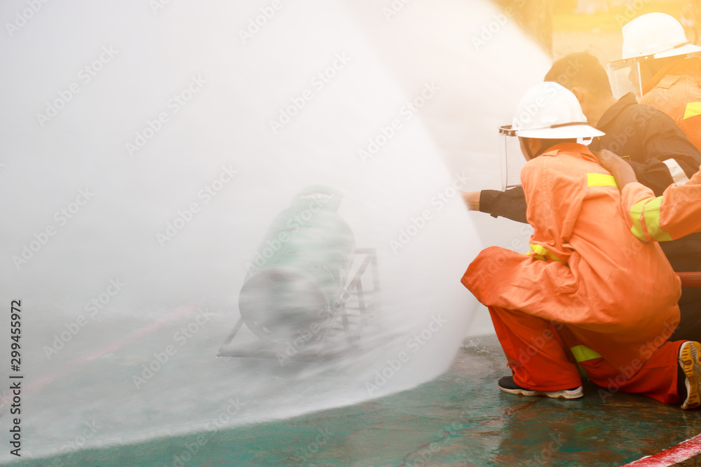 Chemical is sprayed by fire extinguisher CO2 type to cover on valve of ...
