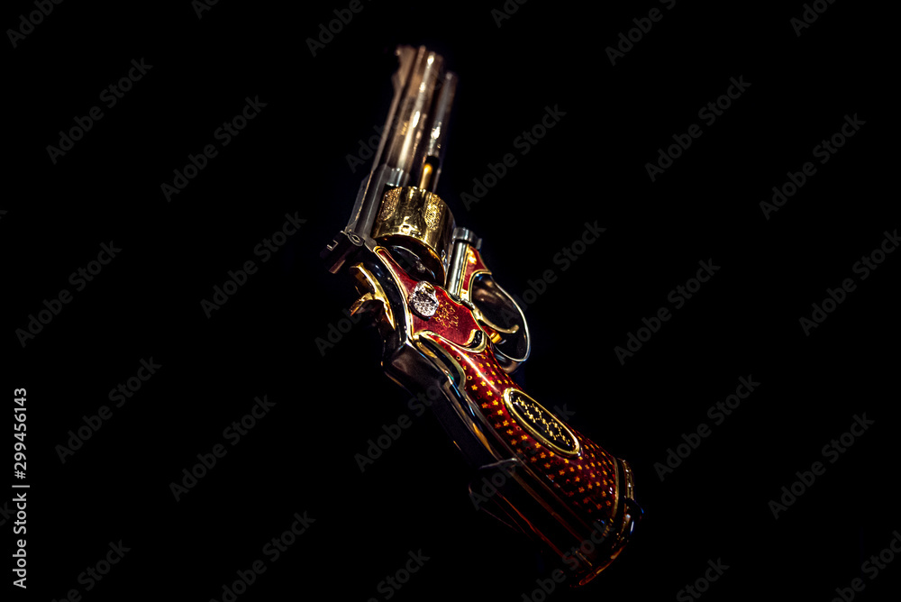 LONDON,ENGLAND,DECEMBER 10th,2018: pistol revolver isolated on black ...