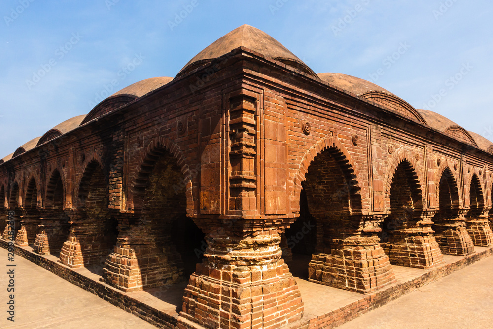 A symmetrical profile of the ornate, arched corridors of the ancient ...