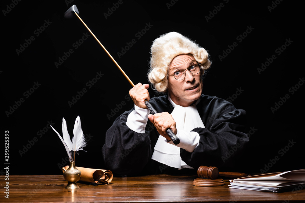angry judge in judicial robe and wig holding golf club isolated on ...