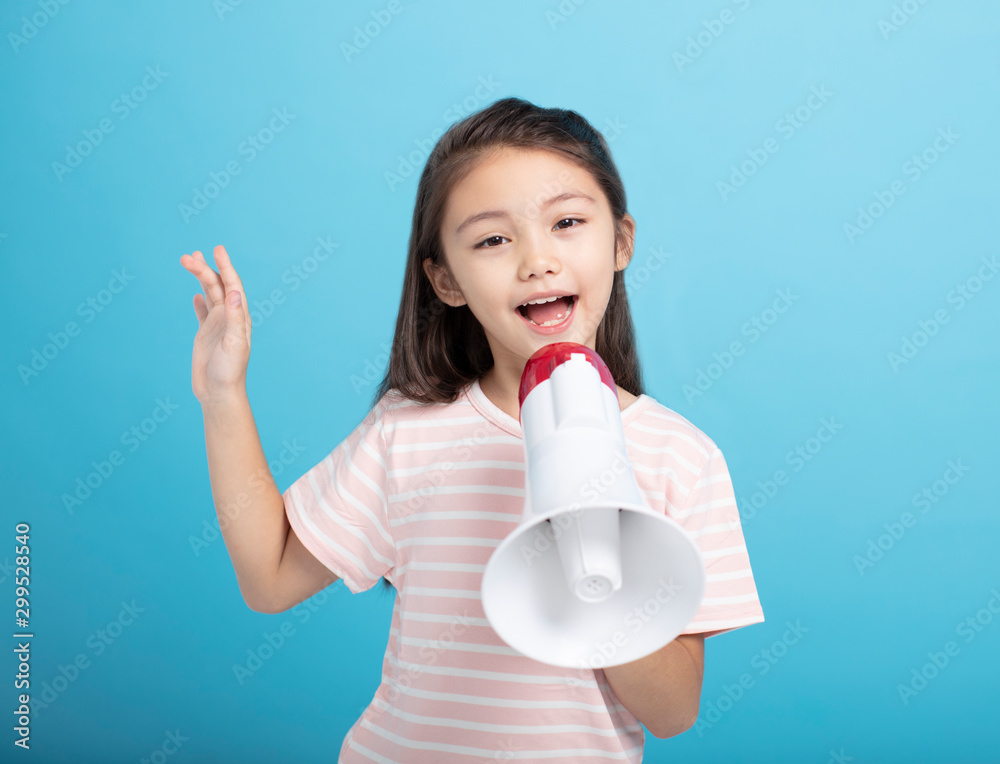 Little girl screaming and shouting with megaphone Stock Photo | Adobe Stock