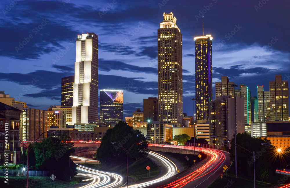 Skyline of Downtown Atlanta and Blurred Highway Traffic at Dusk ...